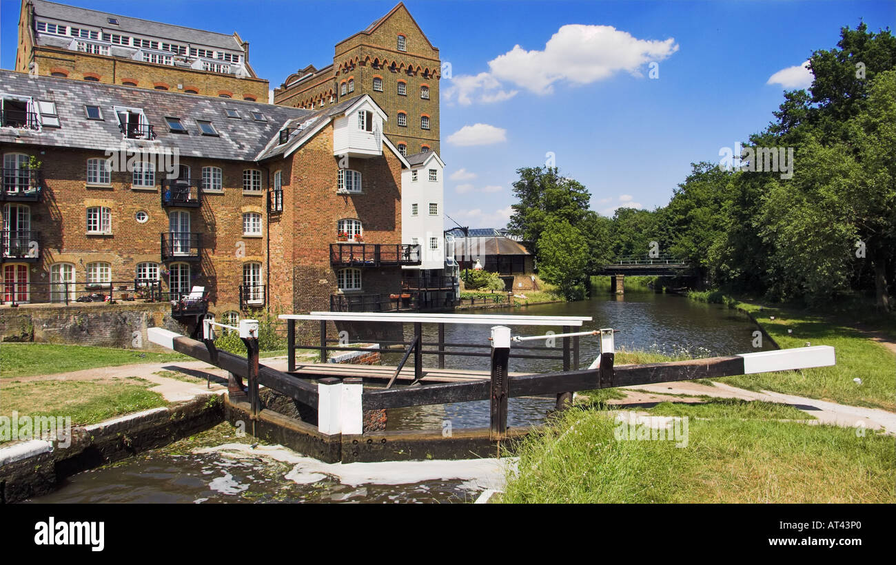 Old mill buildings at Coxs Lock on the River Wey Navigation canal ...