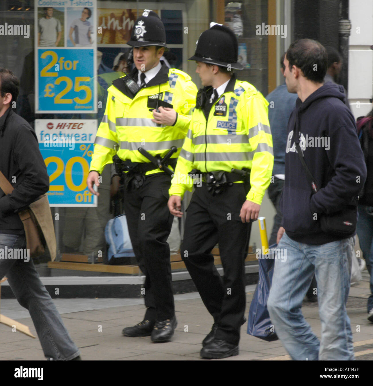 Two police officers on routine patrol in Oxford city centre Stock Photo ...
