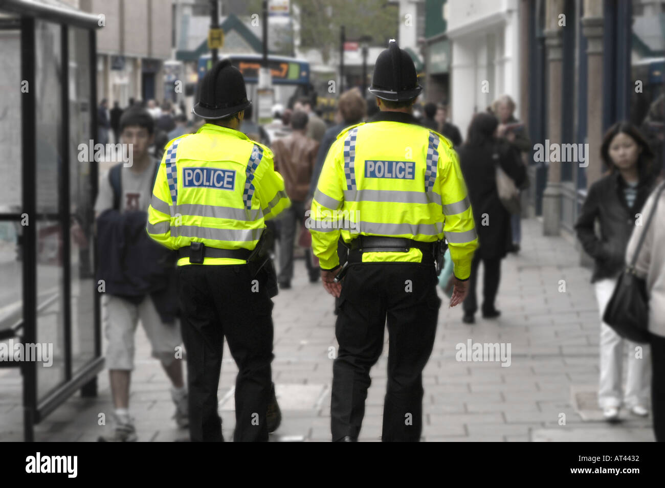 Two police officers on routine patrol in Oxford city centre Stock Photo ...