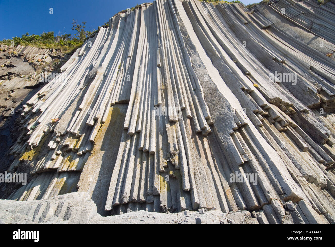 Volcanic rock formations at Stolbchaty Cape on Kunashir Island in Kuril ...