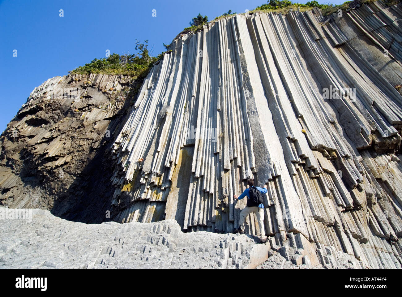 Volcanic rock formations at Stolbchaty Cape on Kunashir Island in Kuril ...