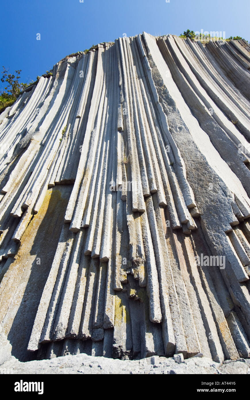 Volcanic rock formations at Stolbchaty Cape on Kunashir Island in Kuril ...