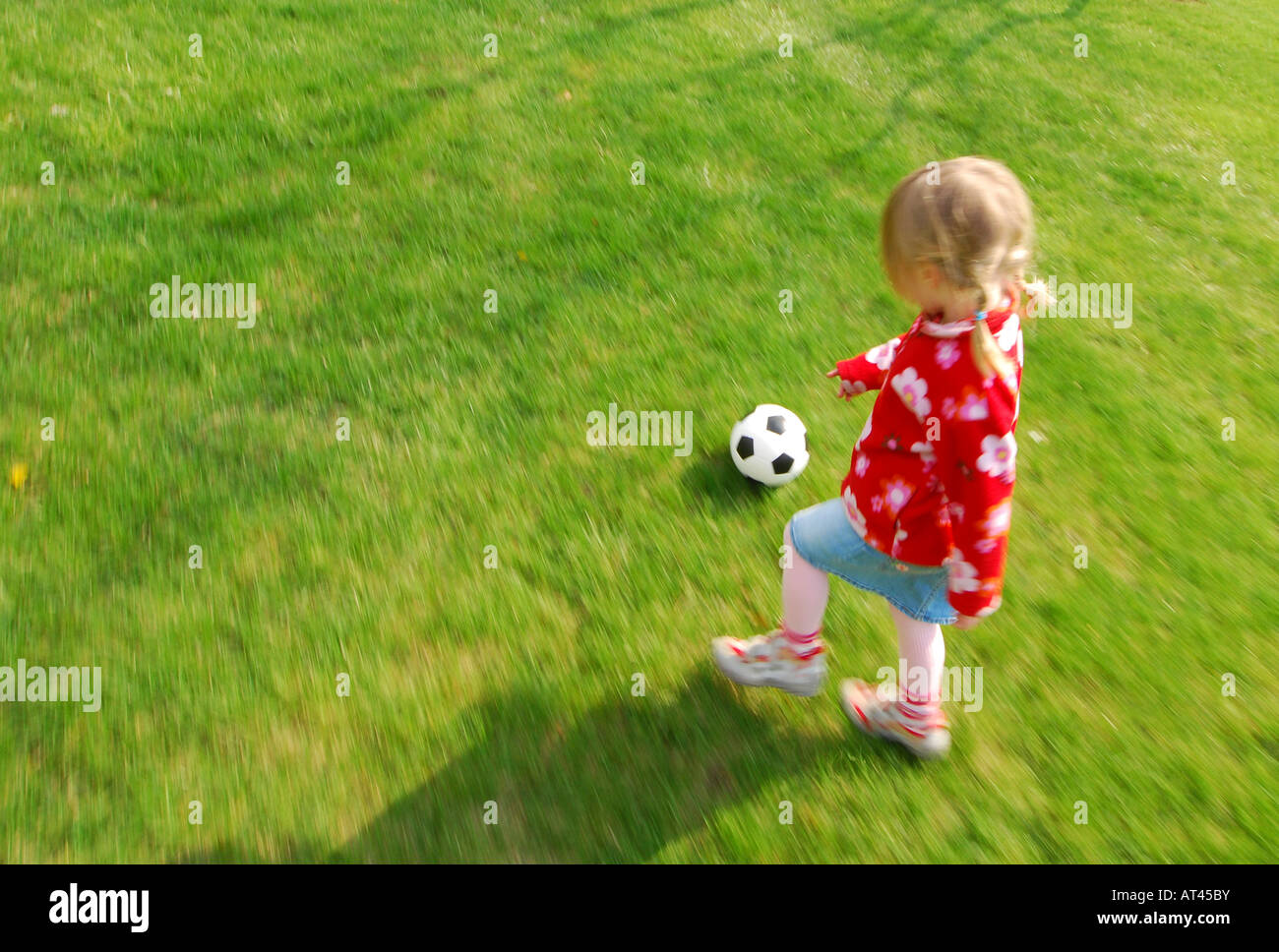 Child playing soccer Stock Photo - Alamy