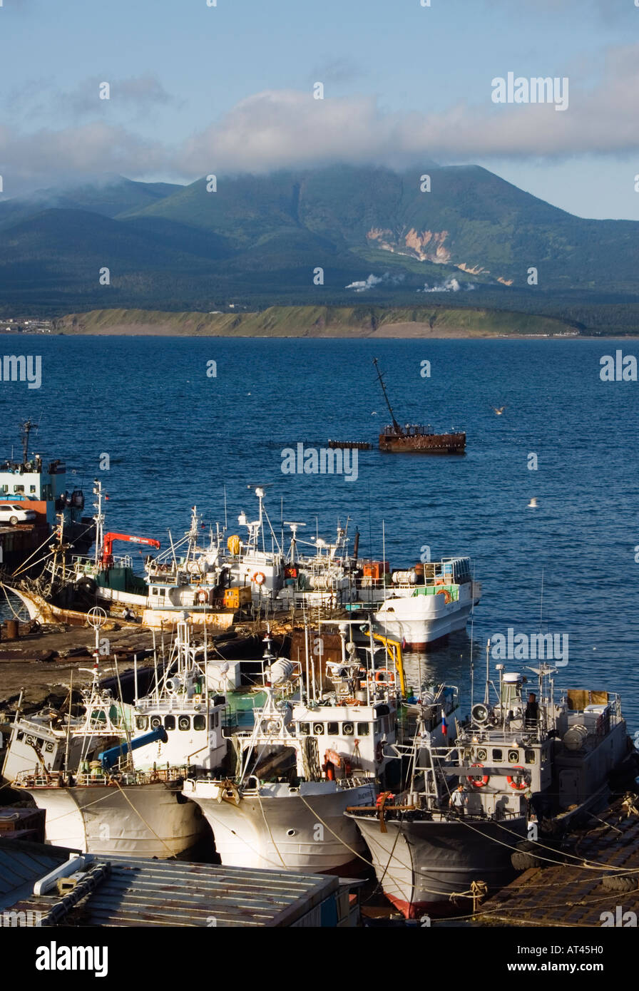 Fishing boats in harbour at Yuzhno Kurilsk on Kunashir Island in Kuril ...