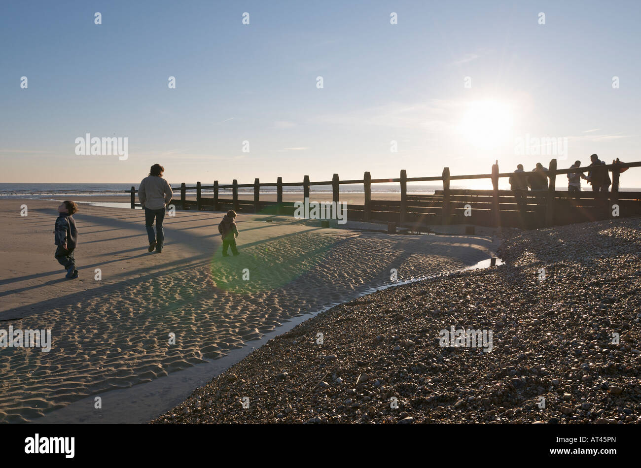 Woman walk children beach hi-res stock photography and images - Alamy