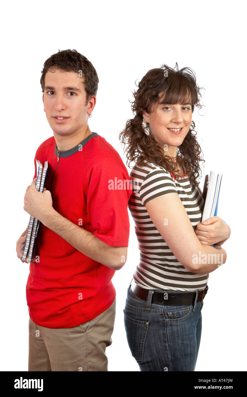 Two students with books over a white background Stock Photo - Alamy