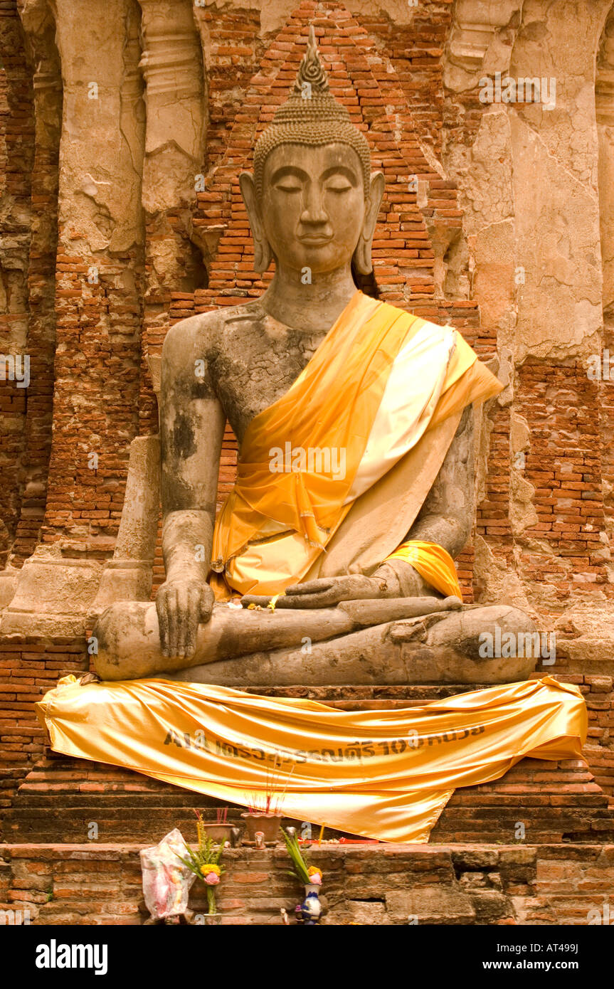 Buddha statue draped in yellow fabric Ayutthaya Thailand Stock Photo ...