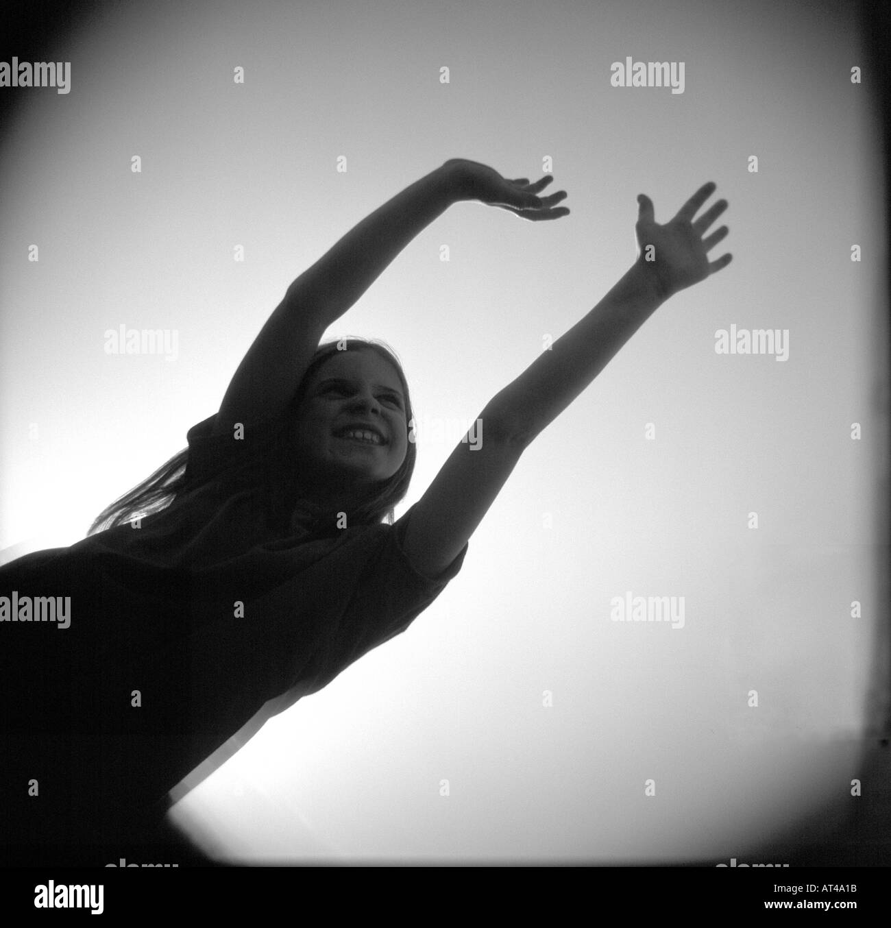 Girl Stretching Arms Stock Photo - Alamy