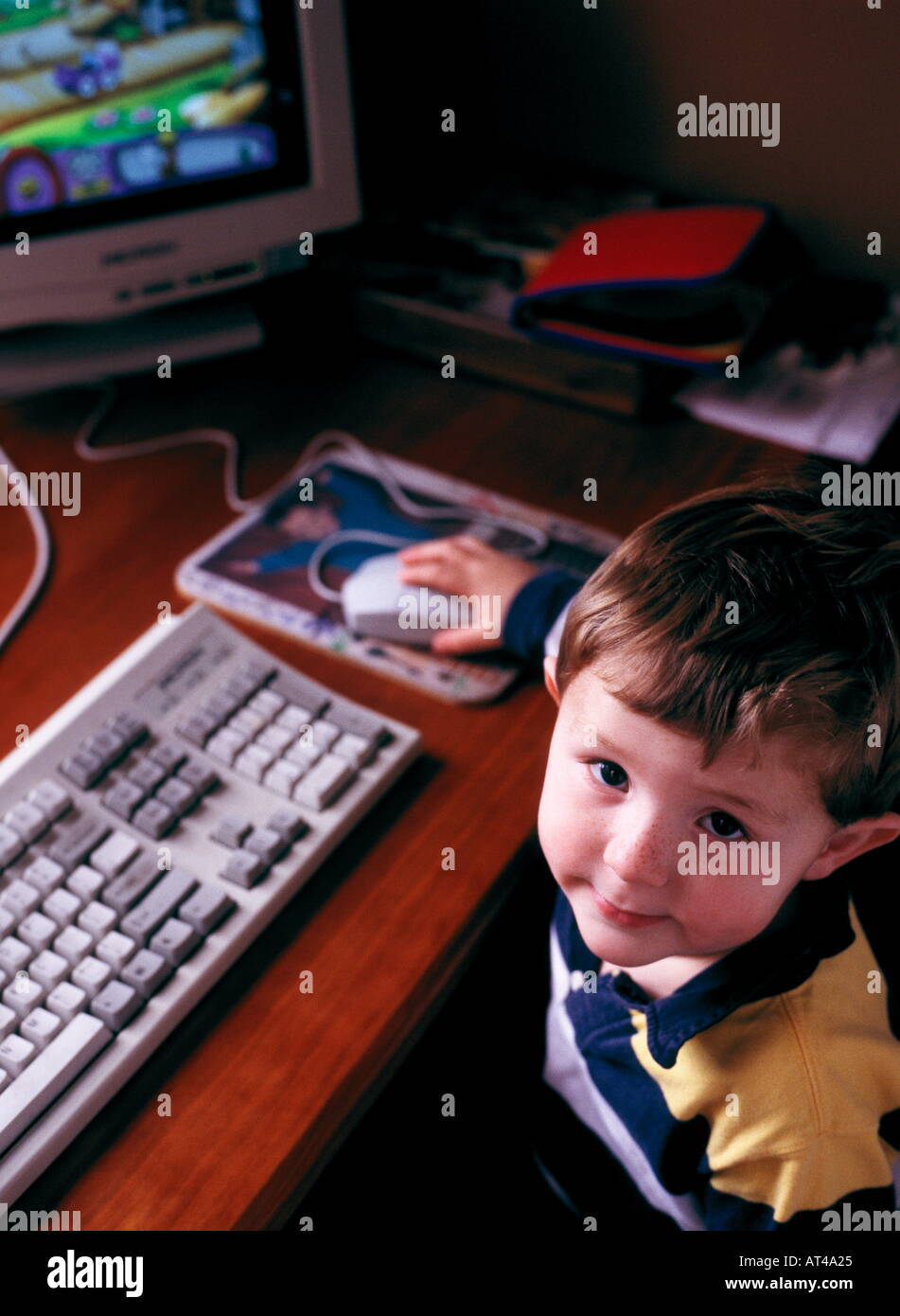 Child on Computer Stock Photo - Alamy