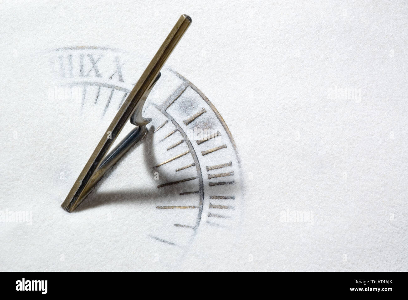 Sundial covered with sand Stock Photo - Alamy