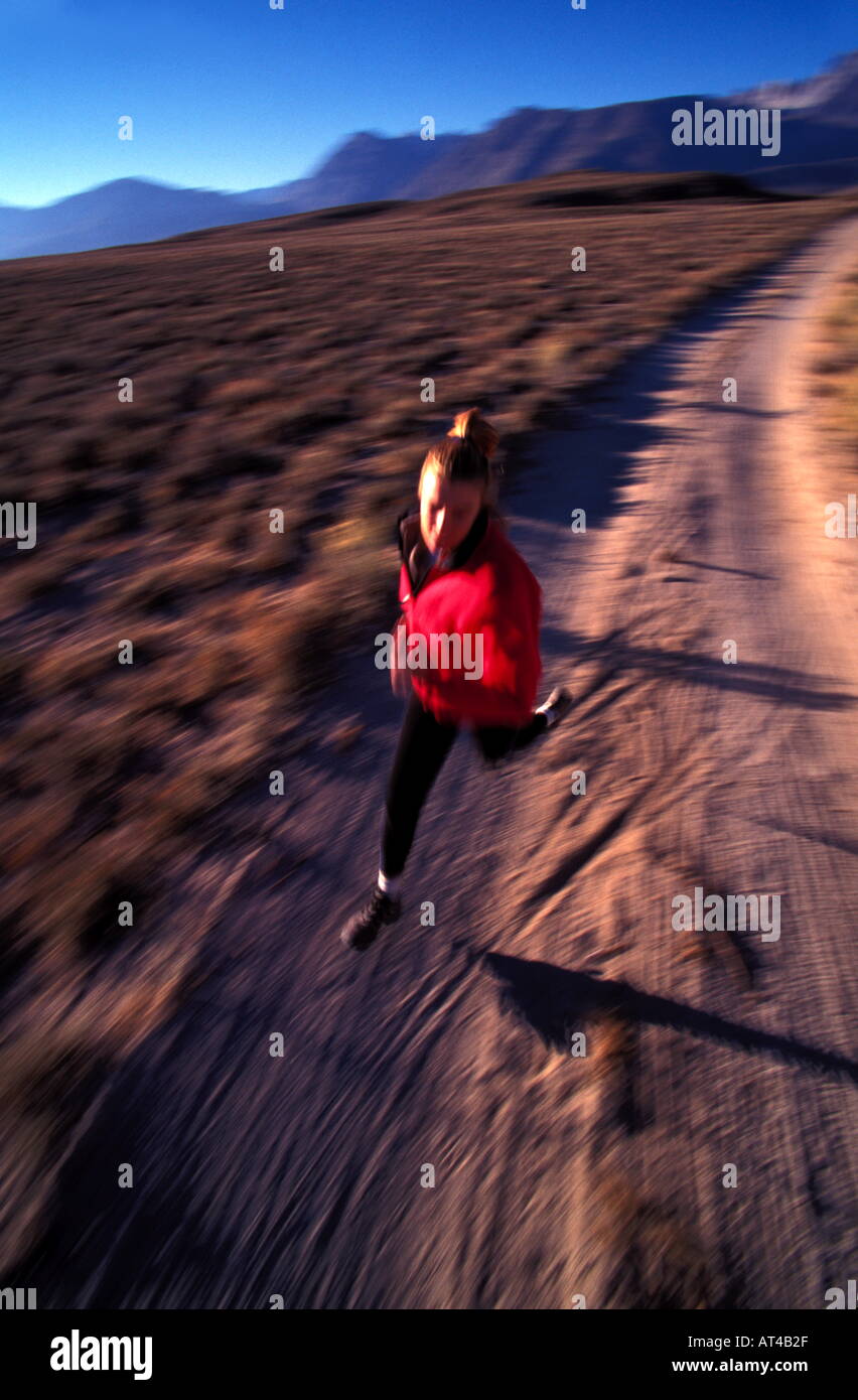 Woman Running California desert Stock Photo - Alamy