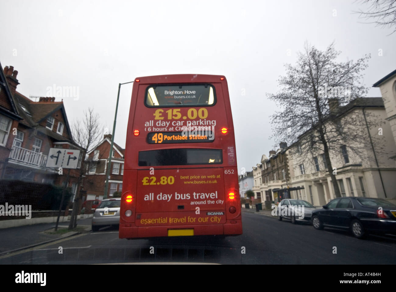 Back view big red bus dusk[double decker] Stock Photo - Alamy