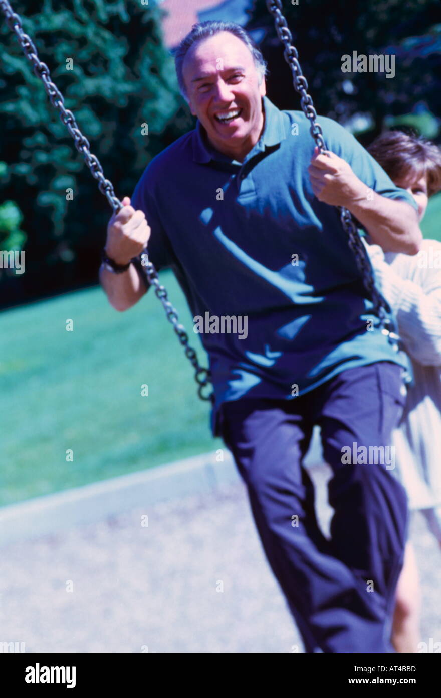 Couples swing hi-res stock photography and images - Alamy