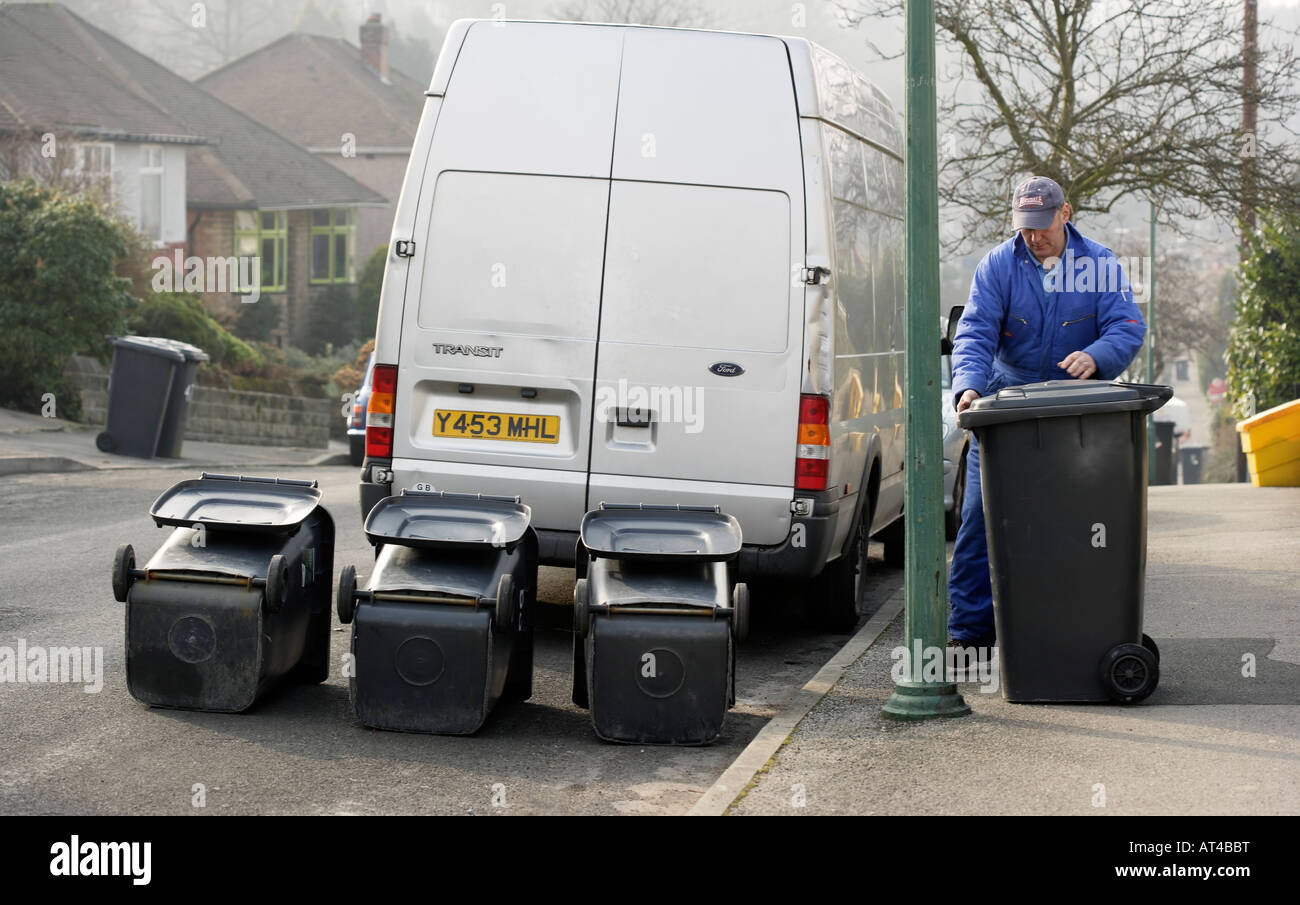 Cleaning wheelie bins Stock Photo - Alamy