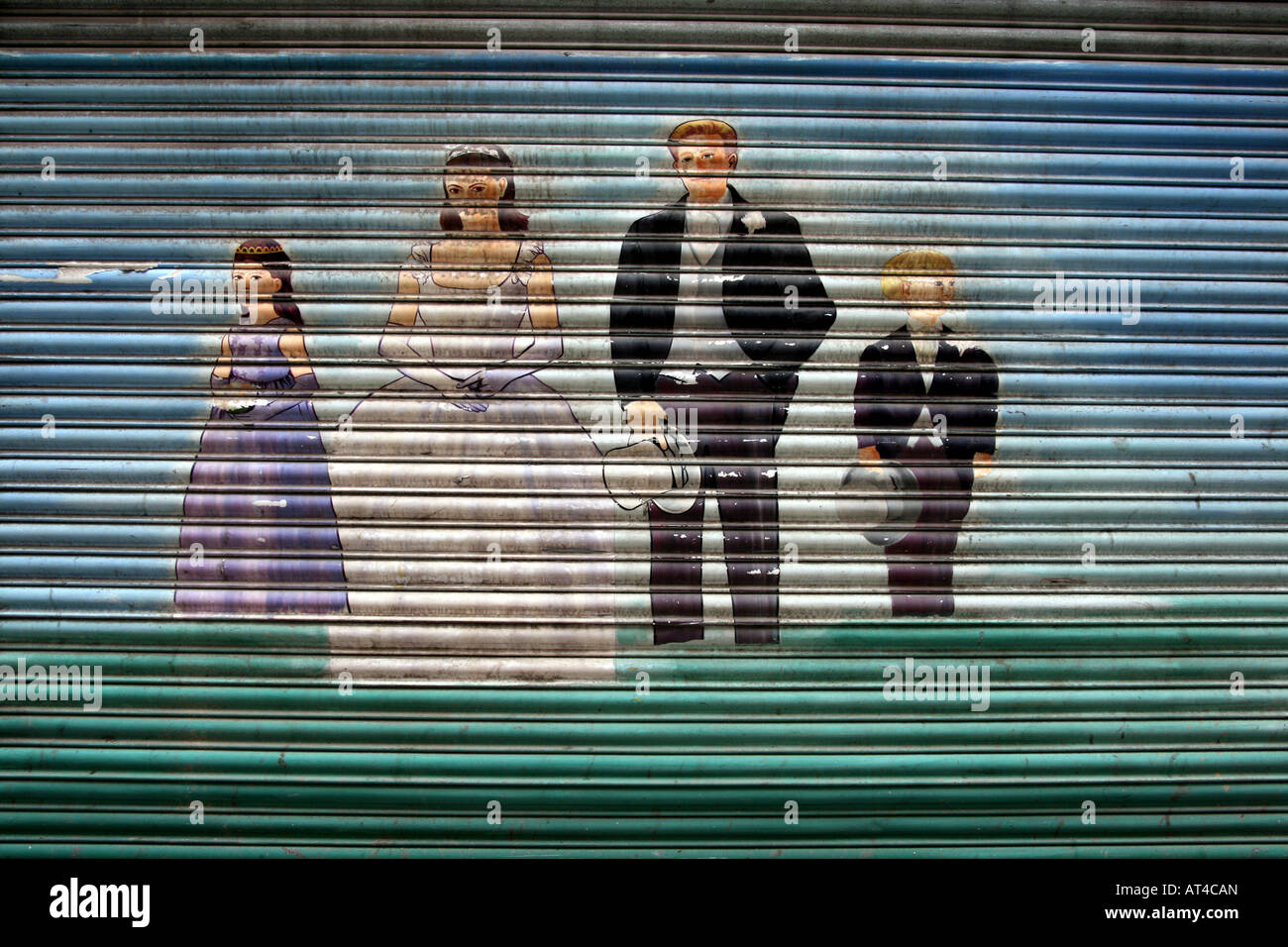 "Security Shutter Artwork on a closed wedding outfitters Hire Store ...