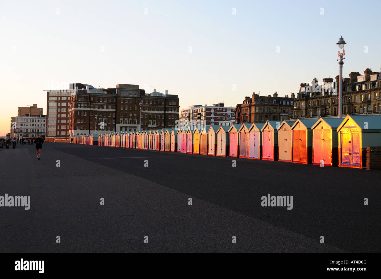 Brighton beach huts sunset hi-res stock photography and images - Alamy