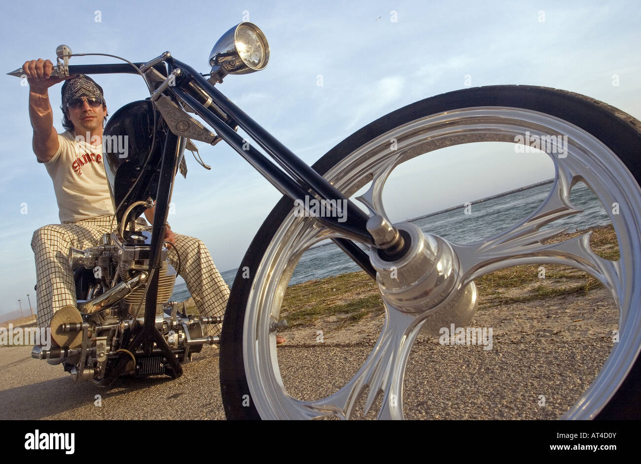 A young man shows off his motorbike in Miami Beach, FL Stock Photo - Alamy