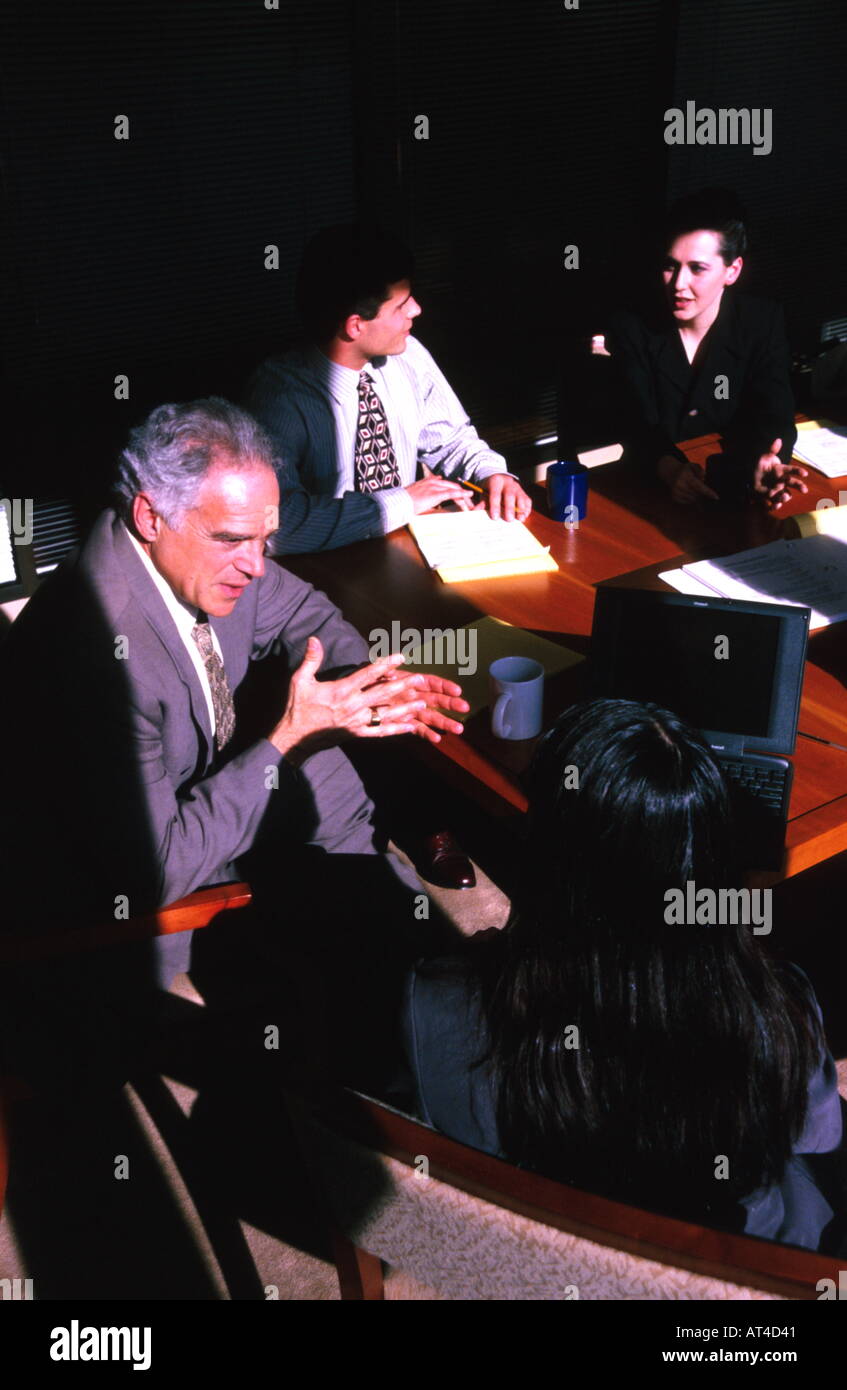 Business Men and Women at Conference Table Stock Photo - Alamy