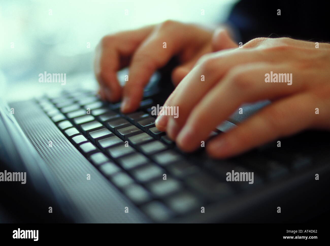 Typing on a Keyboard Stock Photo - Alamy