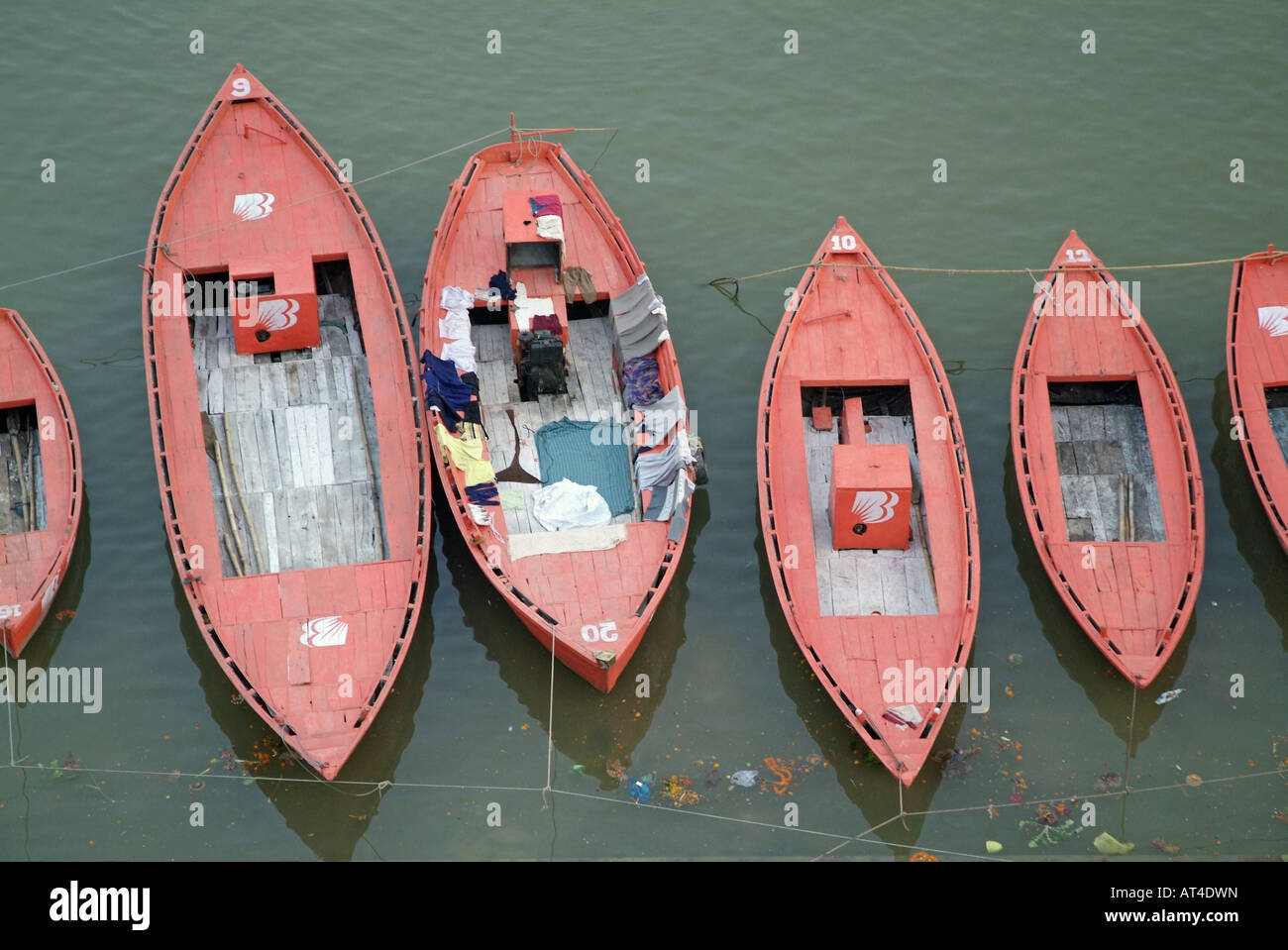 Row boats on the Ganges River in Varanasi, India Stock Photo - Alamy