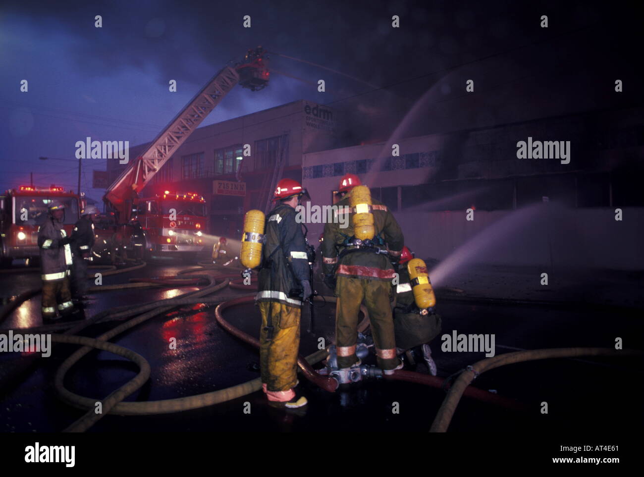 Firemen Fighting a Fire Stock Photo - Alamy Firemen Fighting a Fire Stock Photo - Alamy