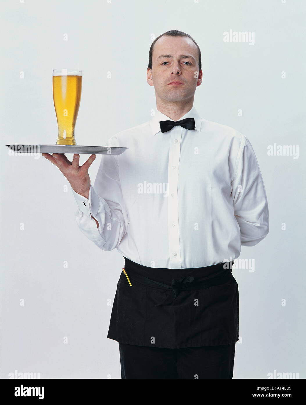 waiter serving beer Stock Photo - Alamy