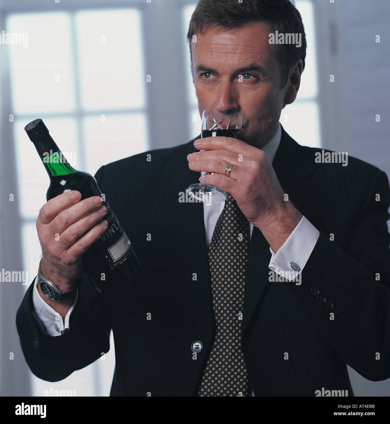 man tasting red wine Stock Photo - Alamy