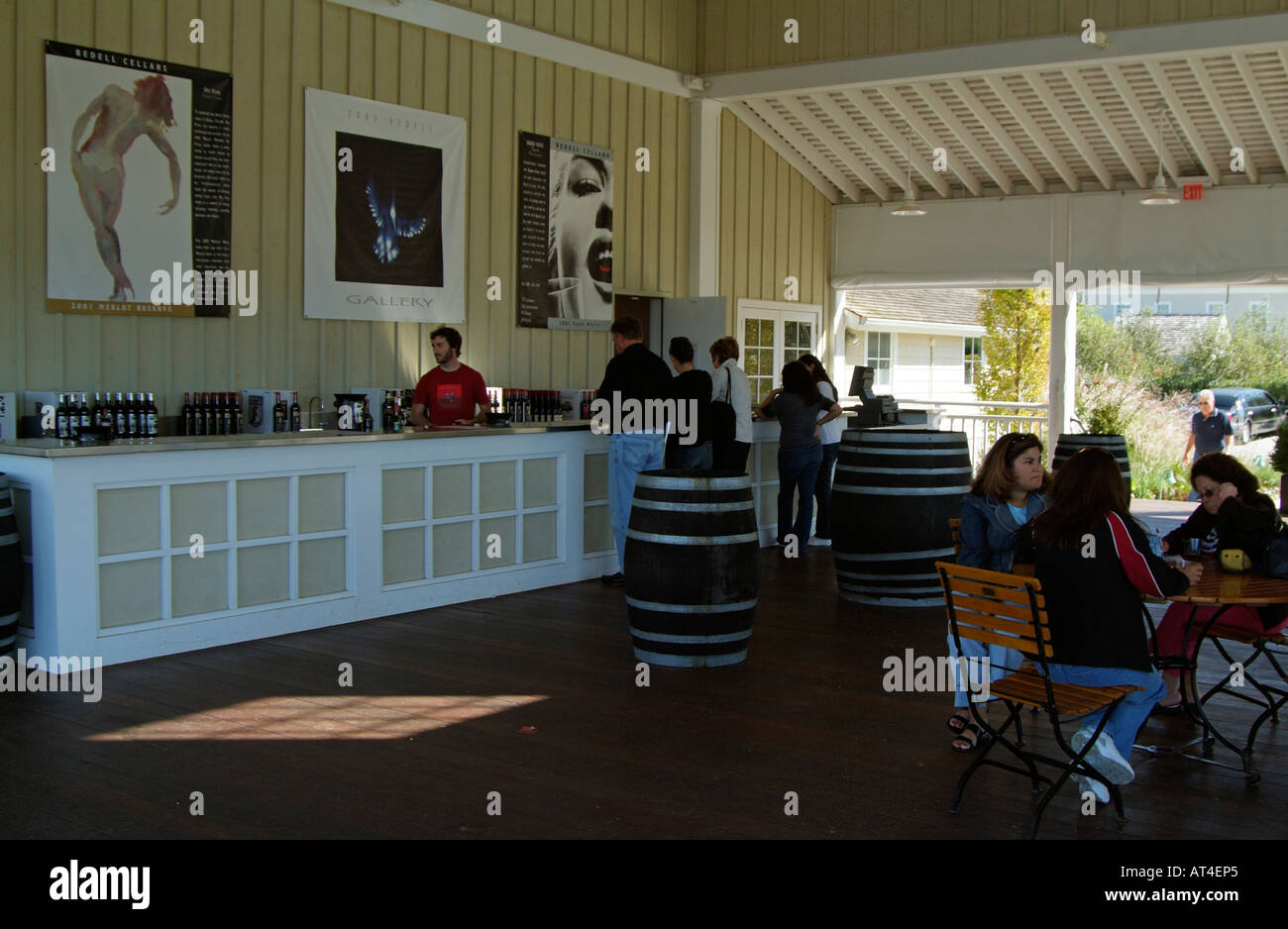 Visitors enjoy a glass of wine at the Bedell Winery at Cutchogue, North ...