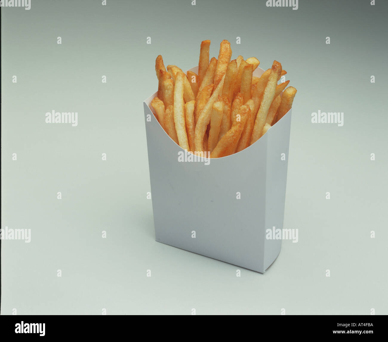 a carton of chips fries Stock Photo - Alamy
