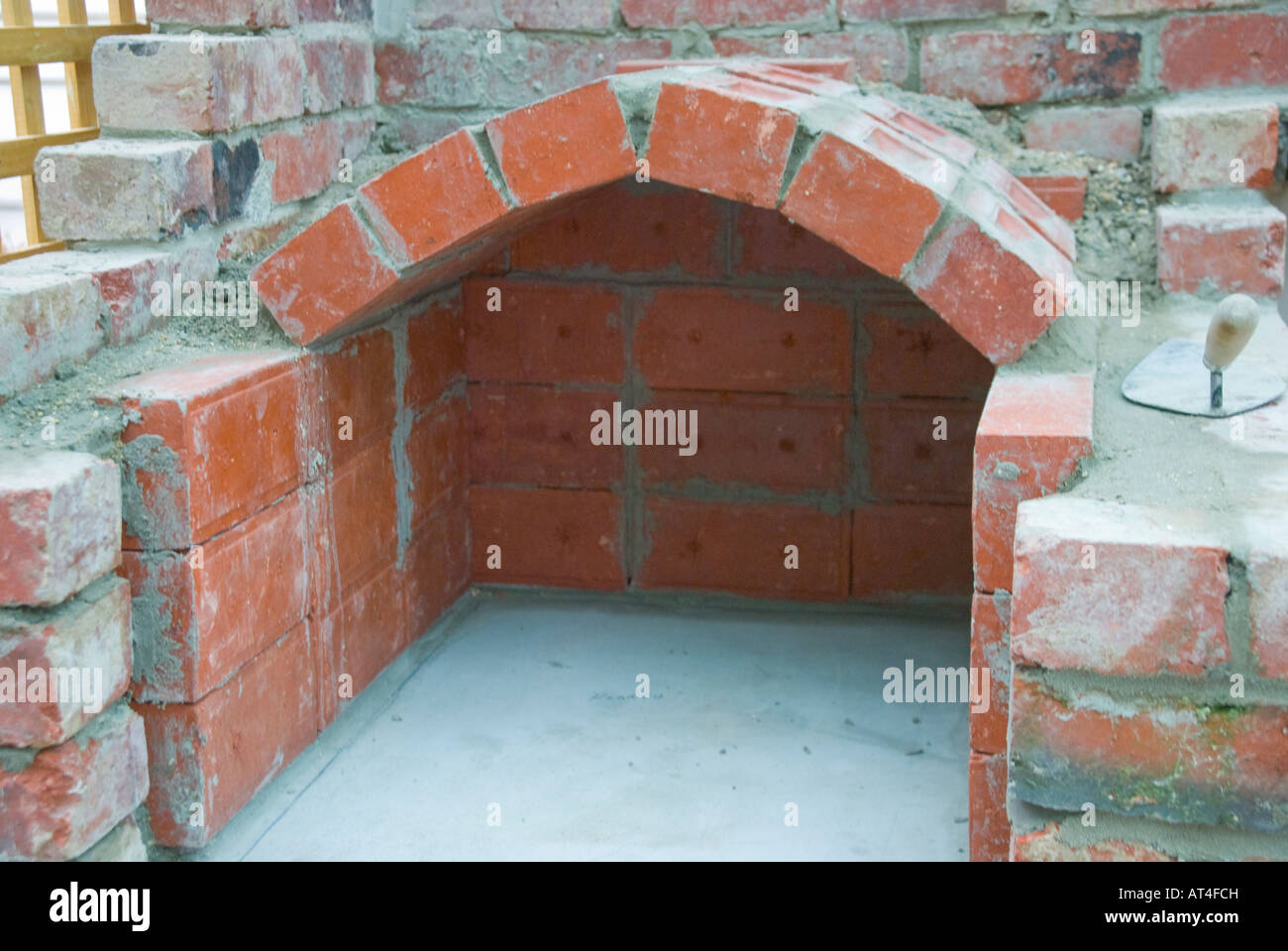 Detail of the fire vault in building an outdoor wood fired oven Stock ...