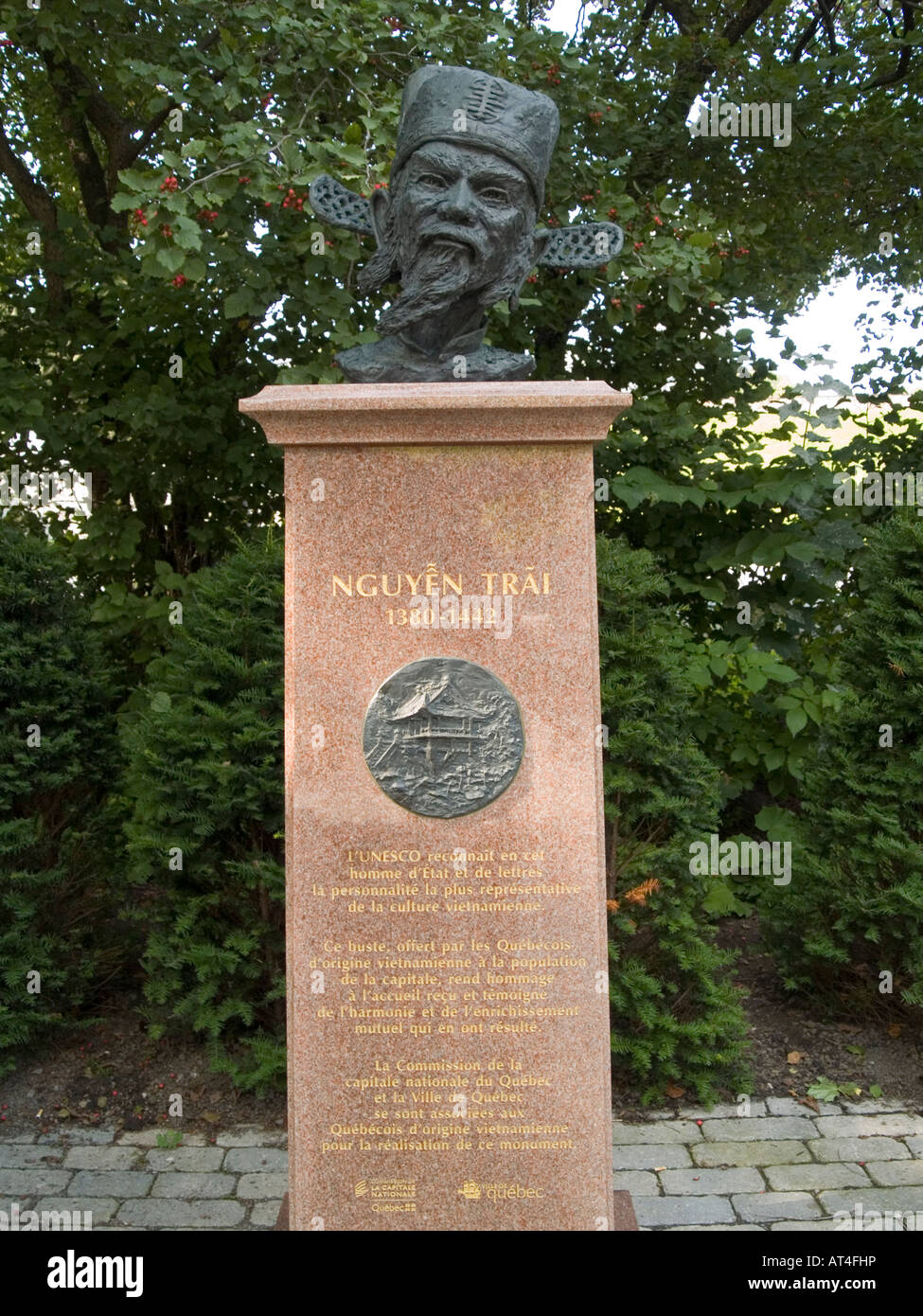 A statue in memorial to Nguyen Trai (1380 - 1442) situated on Rue Saint ...