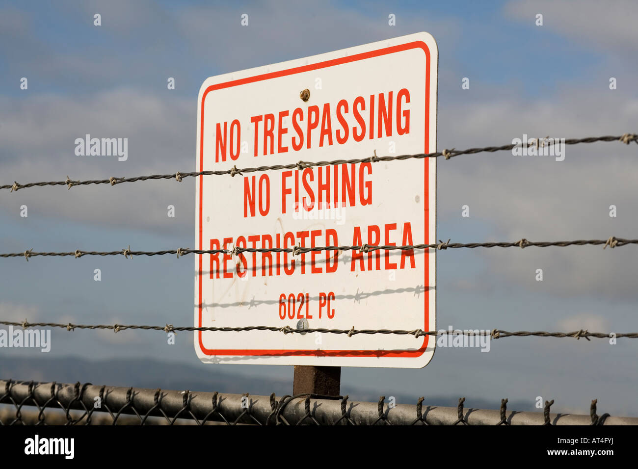 Sign: restricted area, no trespassing, no fishing Stock Photo - Alamy