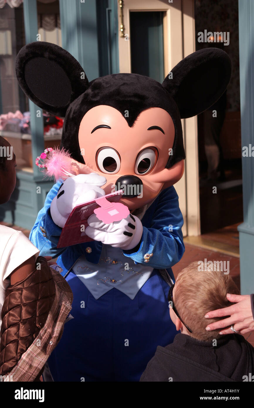 Mickey Mouse signs autographs at Disneyland Stock Photo - Alamy