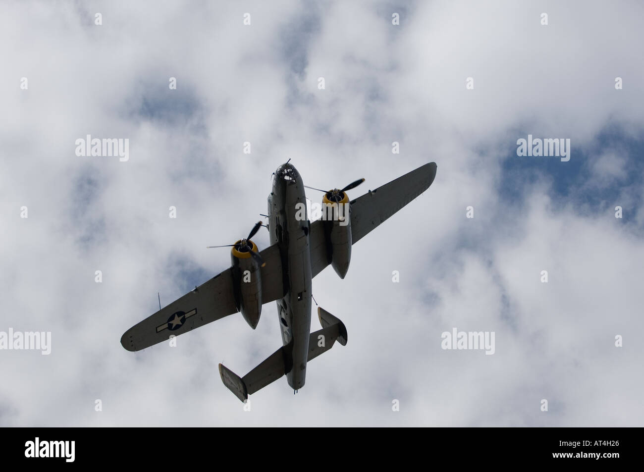 World War II airplane flying over crowd at air show Stock Photo - Alamy