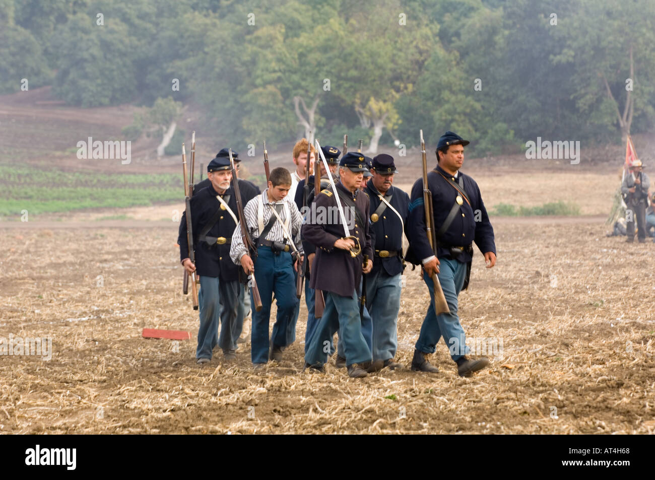 Reenactors marching in single line at Civil War Reenactment event Stock ...