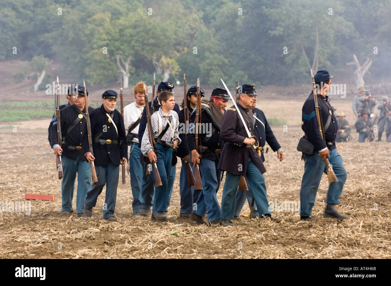 Reenactors marching in single line at Civil War Reenactment event Stock ...