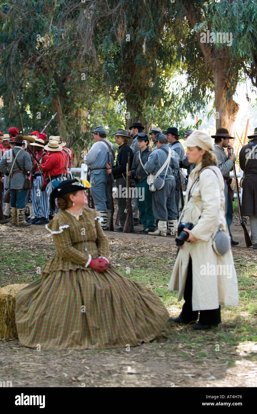 Female reenactor and photographer chatting at Civil War Reenactment ...