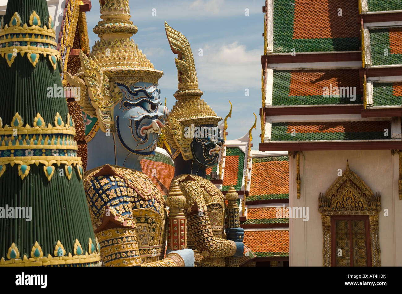 Large mythical beast statues guard next to the Ho Phra Nak building on ...