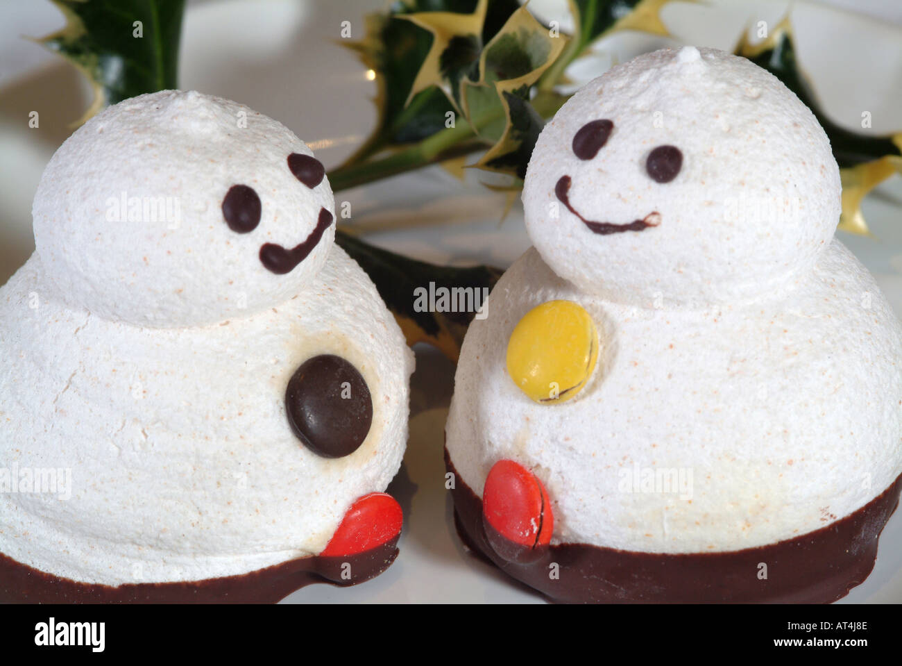 Meringue Snowmen with Smiling Faces and Chocolate Buttons Made for the ...