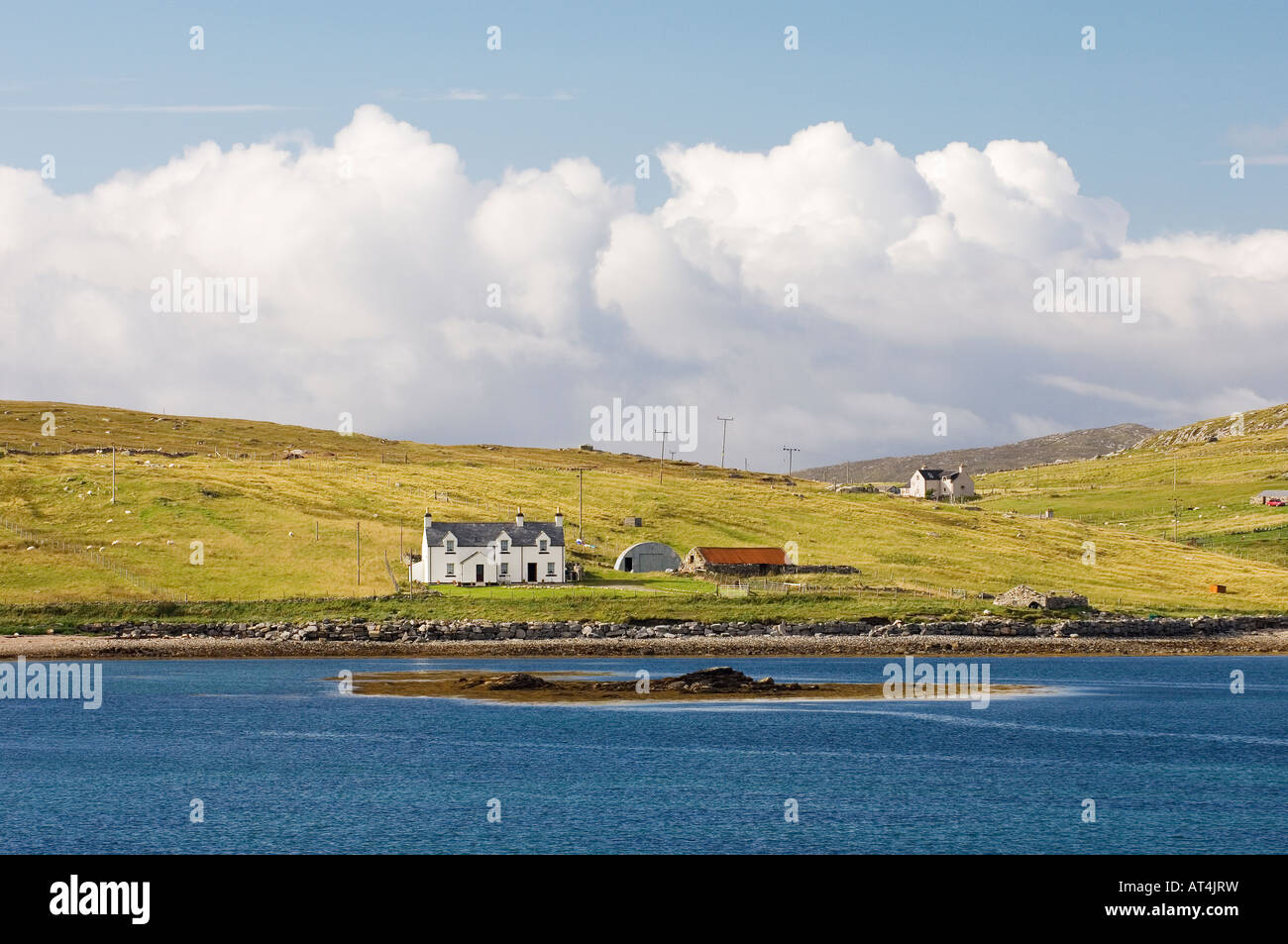 Fishermens cottages houses on island of Berneray in the Sound of Harris ...