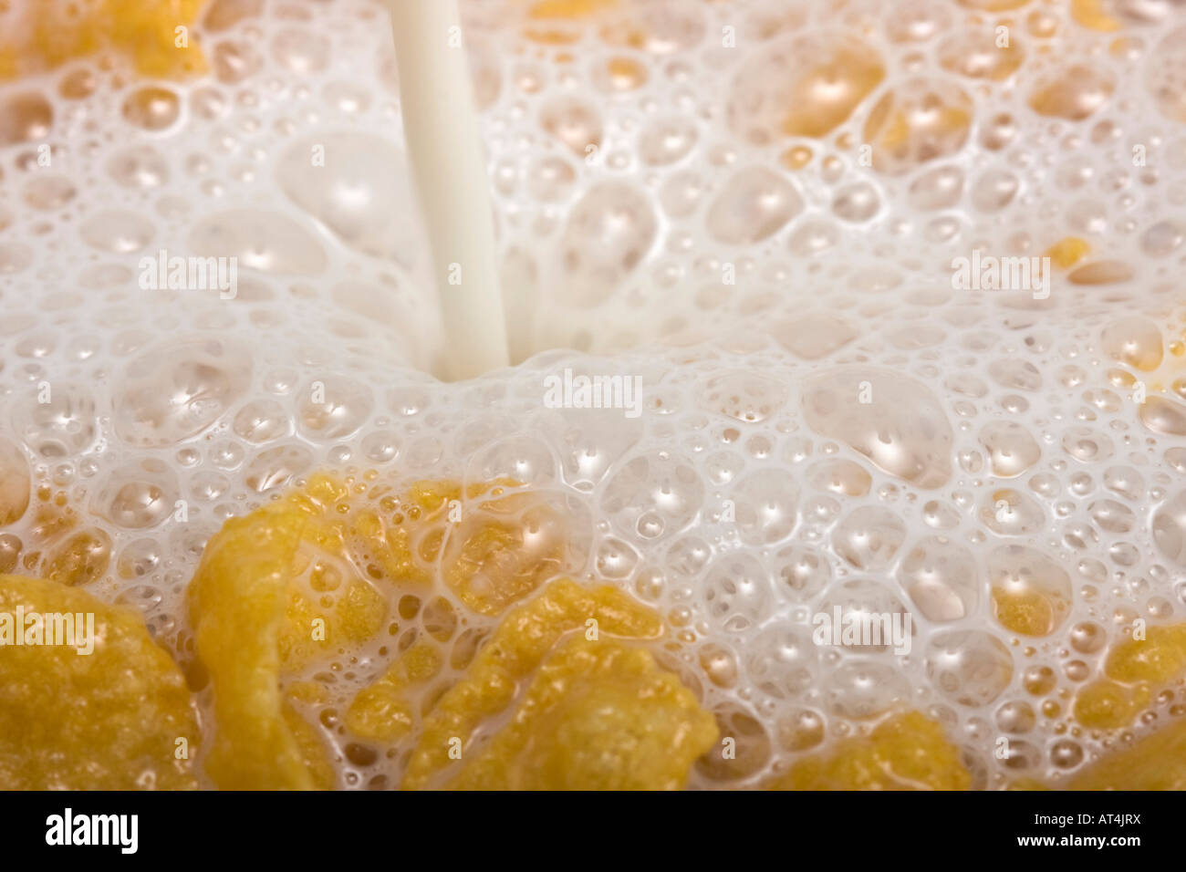 Pouring milk corn flakes close hi-res stock photography and images - Alamy