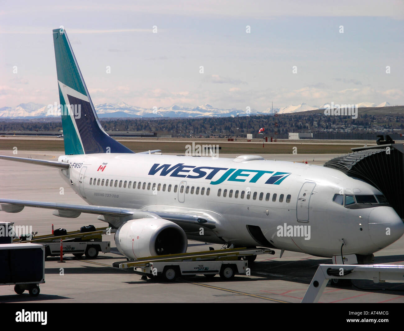Westjet Boeing 737-700 at Calgary International airport Stock Photo - Alamy