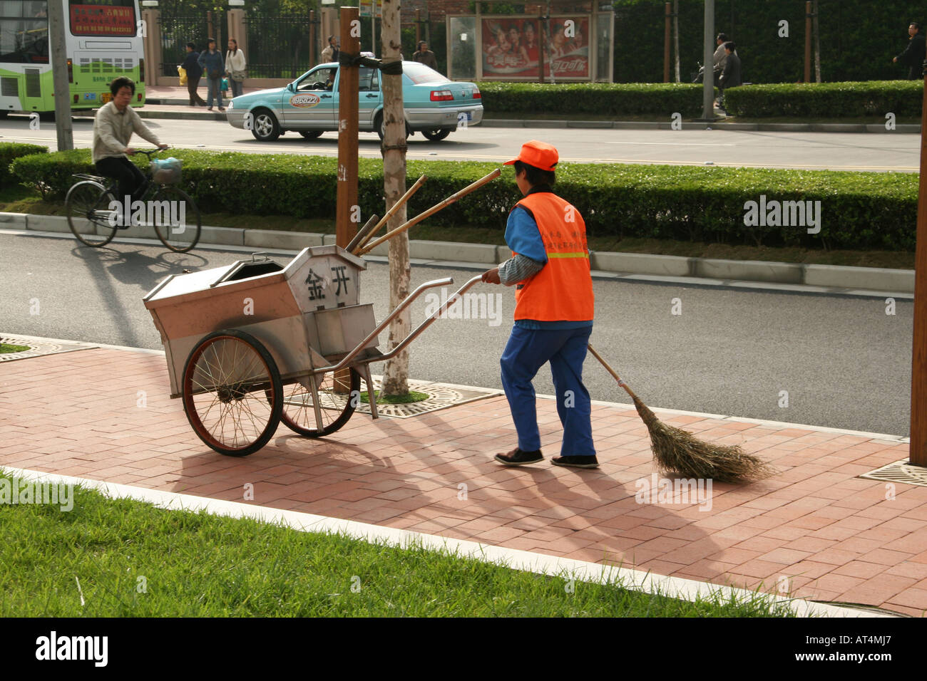 Street cleaner with traditional broom and push cart Stock Photo - Alamy