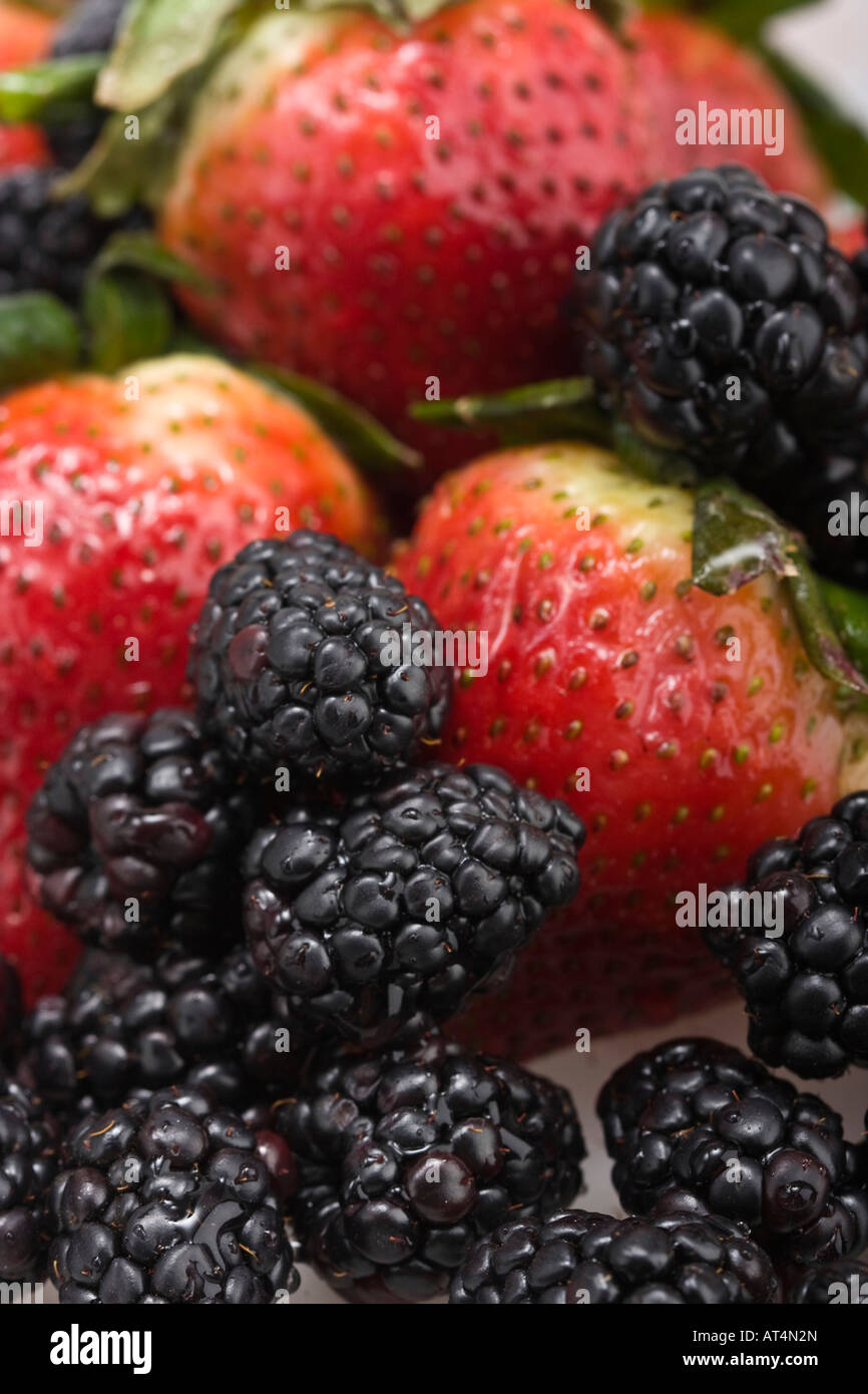 Closeup of organic Strawberries Blackberries fruits edible photo studio ...