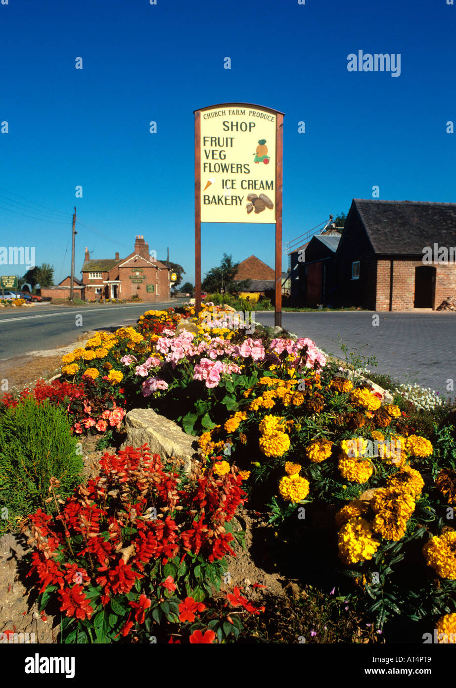 UK Cheshire Marton village flower filled garden of farm shop selling ...