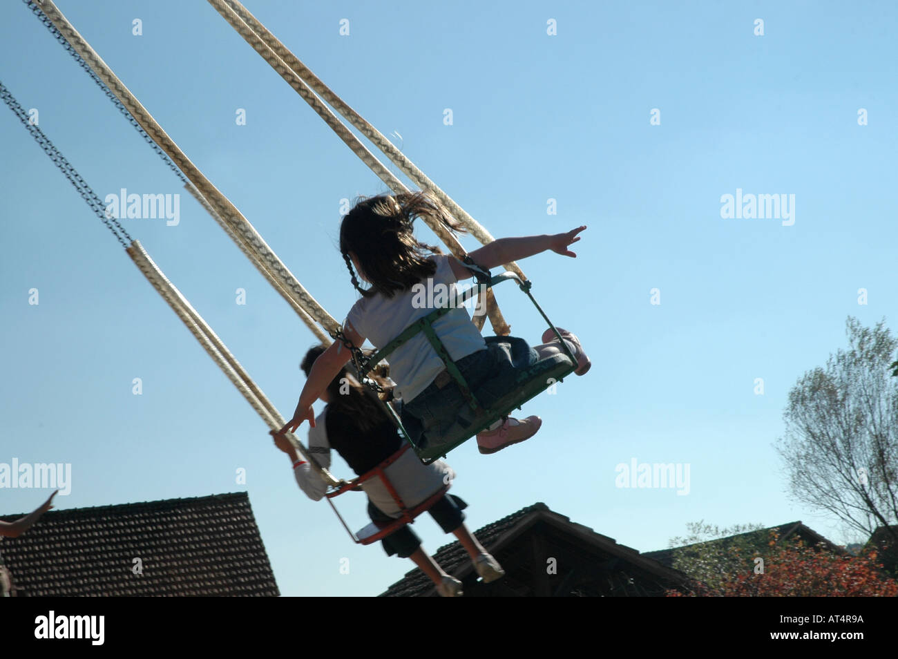 Swinging chairs hi-res stock photography and images - Alamy