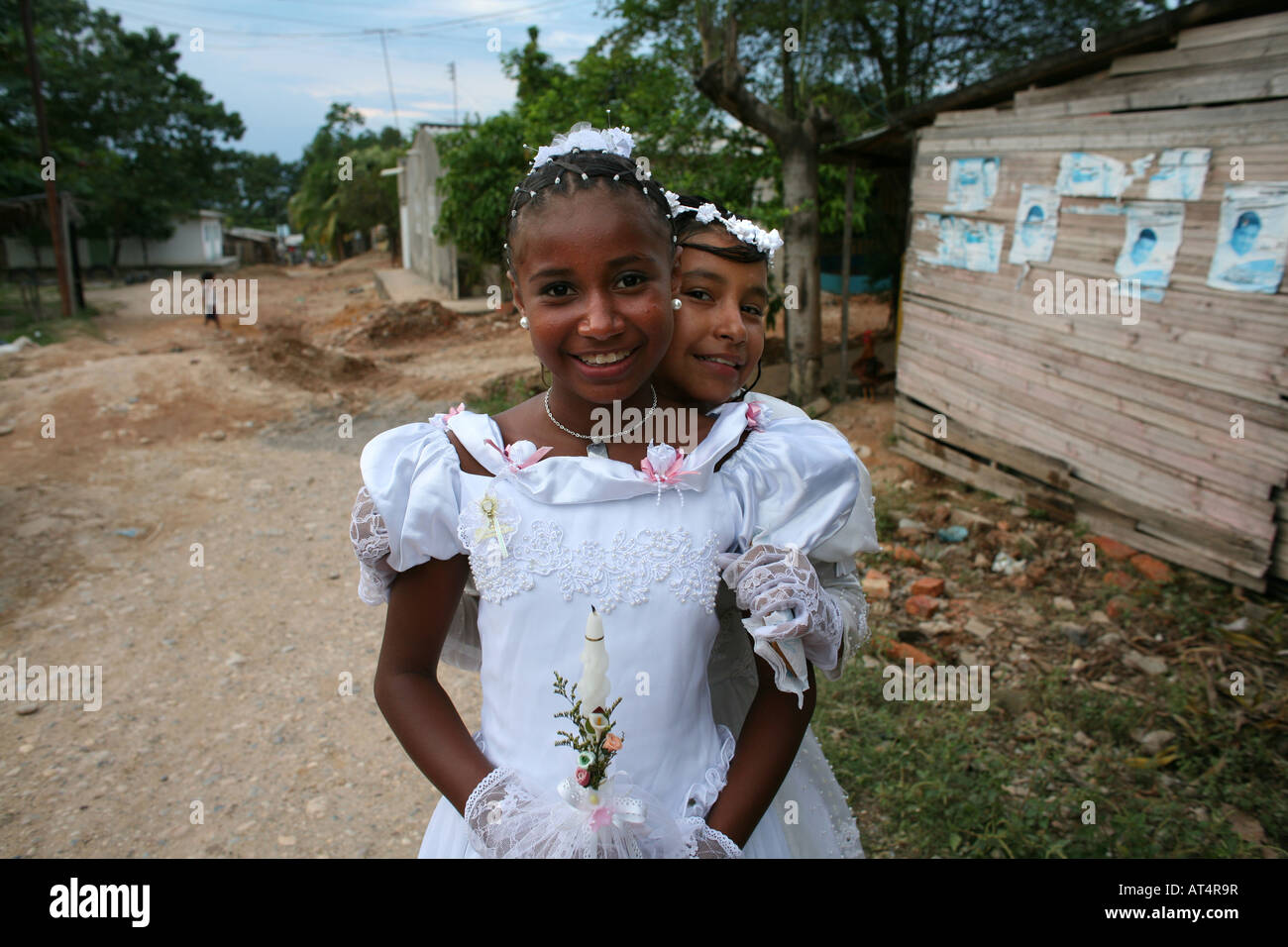 Children celebrate their first commune in the local slum church Stock ...