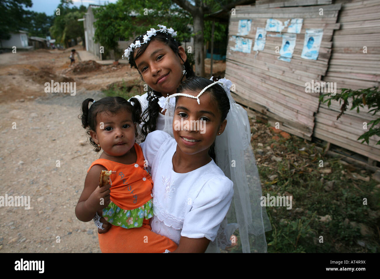 Children celebrate their first commune in the local slum church Stock ...