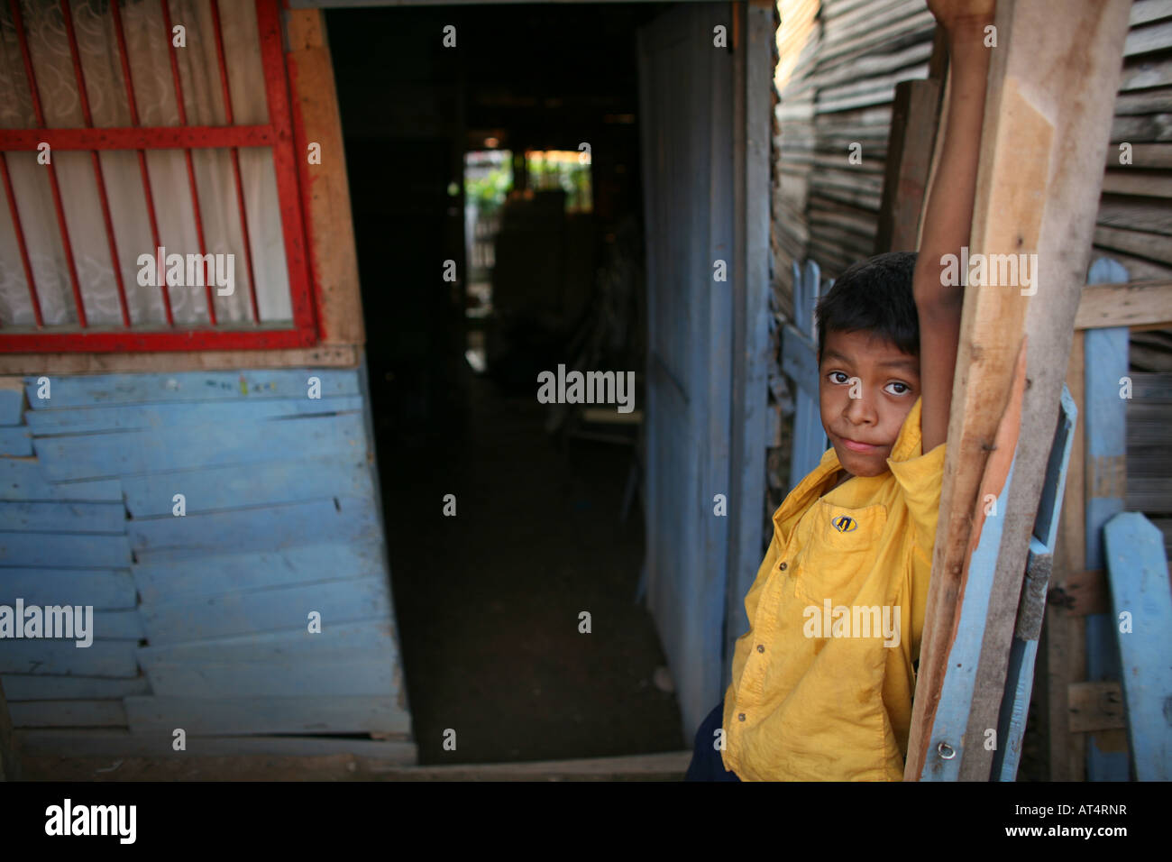 Portrait of a displaced boy in the slums of Colombia Stock Photo - Alamy