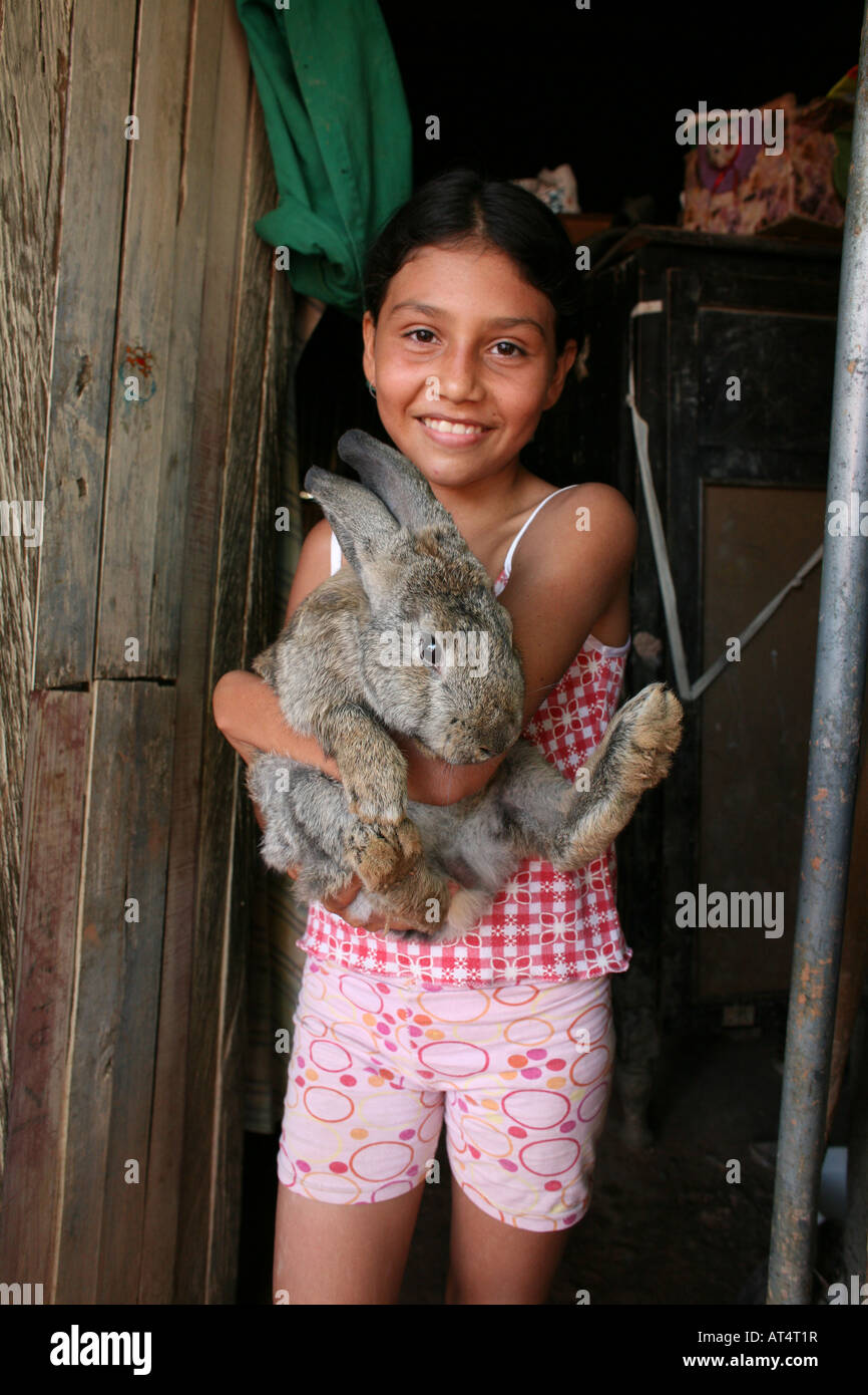 Girl holding rabbit colombia hi-res stock photography and images - Alamy